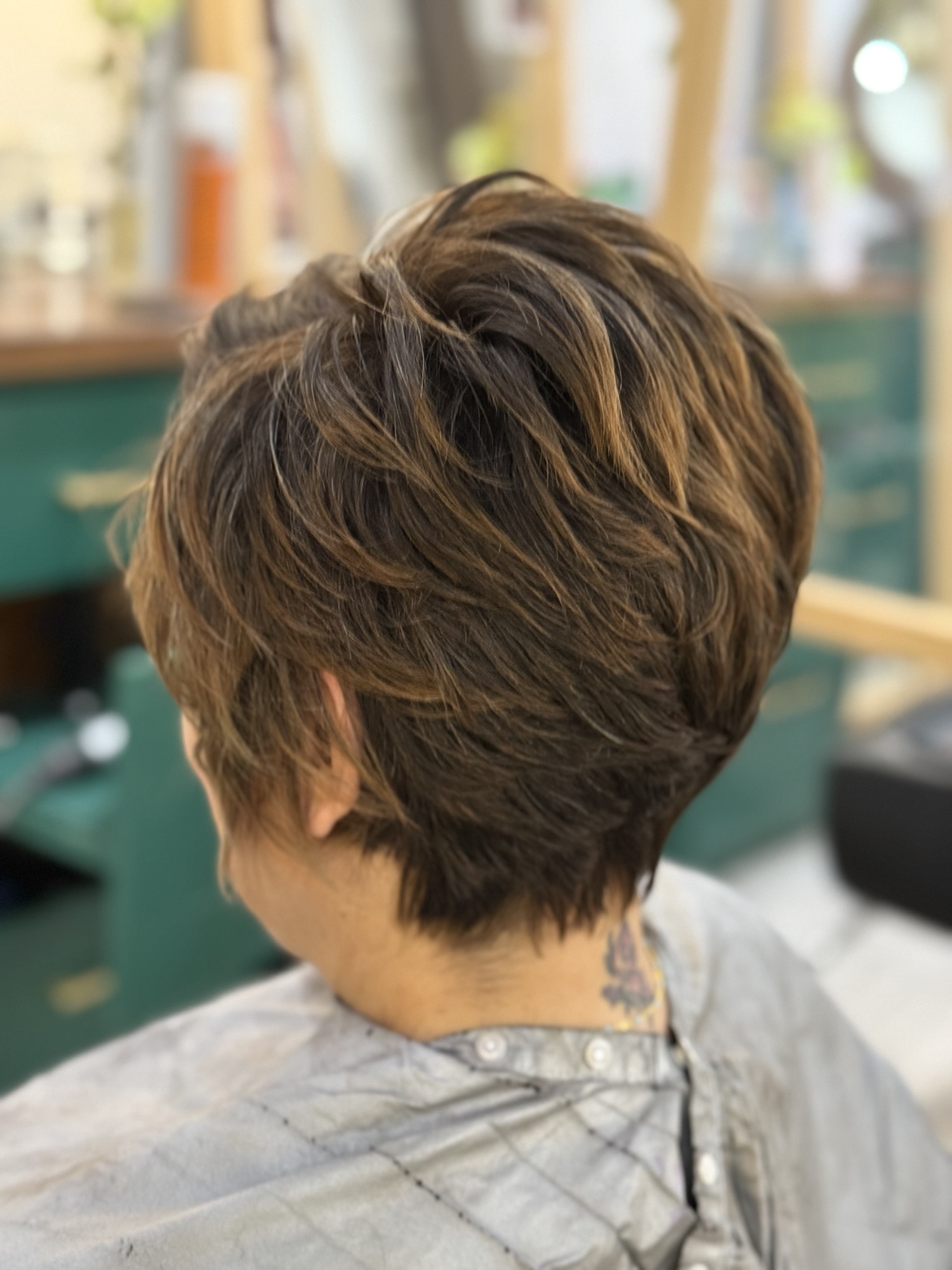 Chic Pixie Texture Haircut for a Bold Look – Aveda Theory Hair Salon